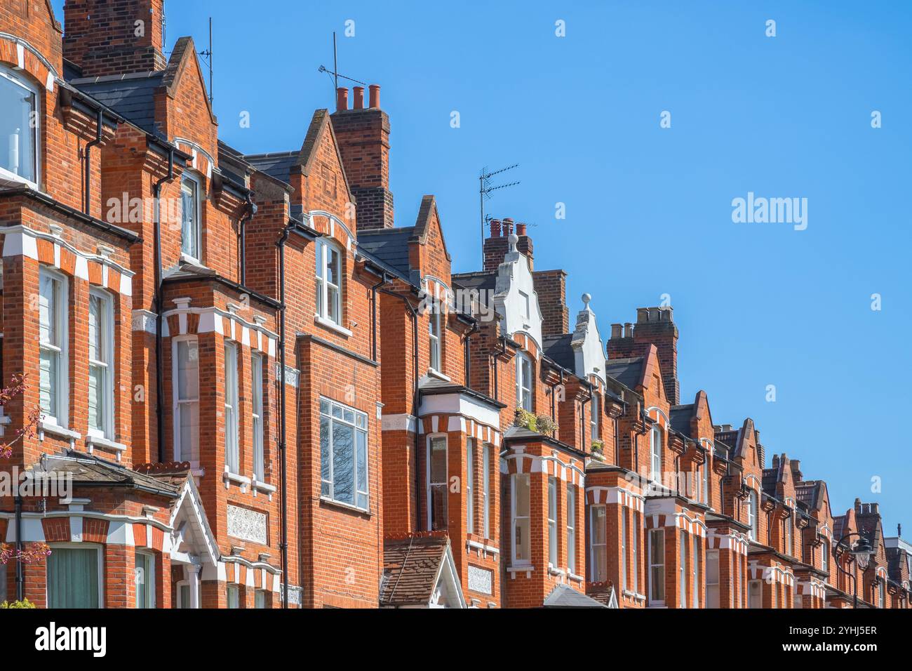 Row of red brick terraced houses around Crouch End area in London Stock ...