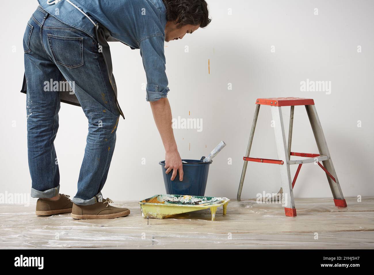 Bucket of orange paint hi-res stock photography and images - Alamy