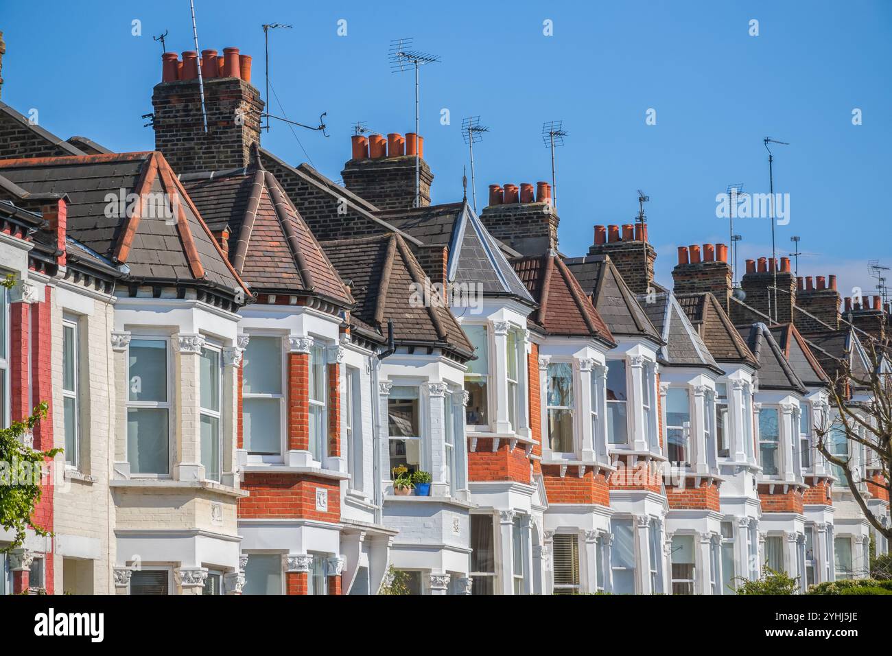 Row of traditional terraced houses in Crouch End area in London, UK ...
