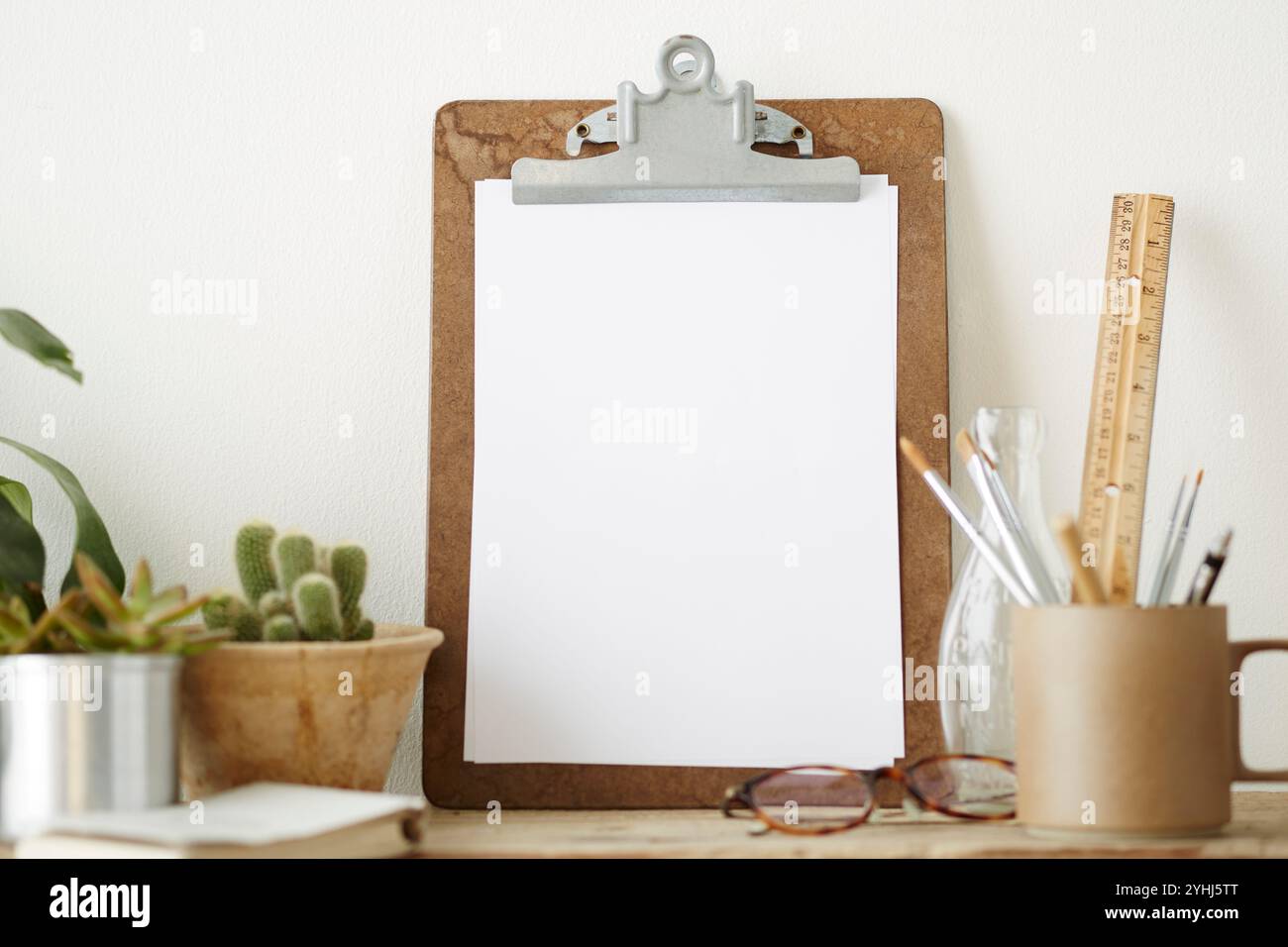 White paper in binder on desk Stock Photo - Alamy