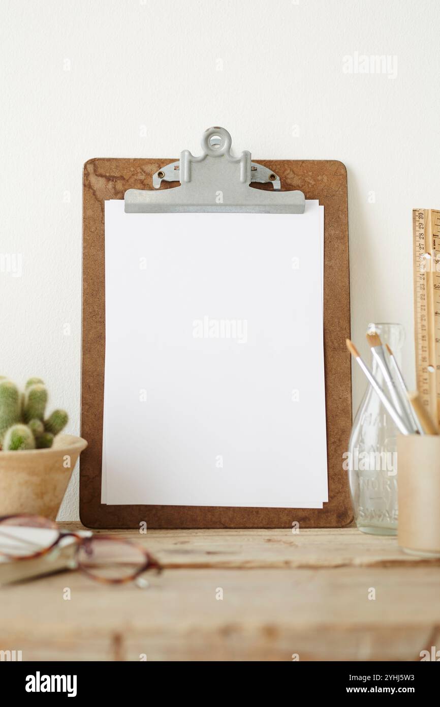 White paper in binder on desk Stock Photo - Alamy