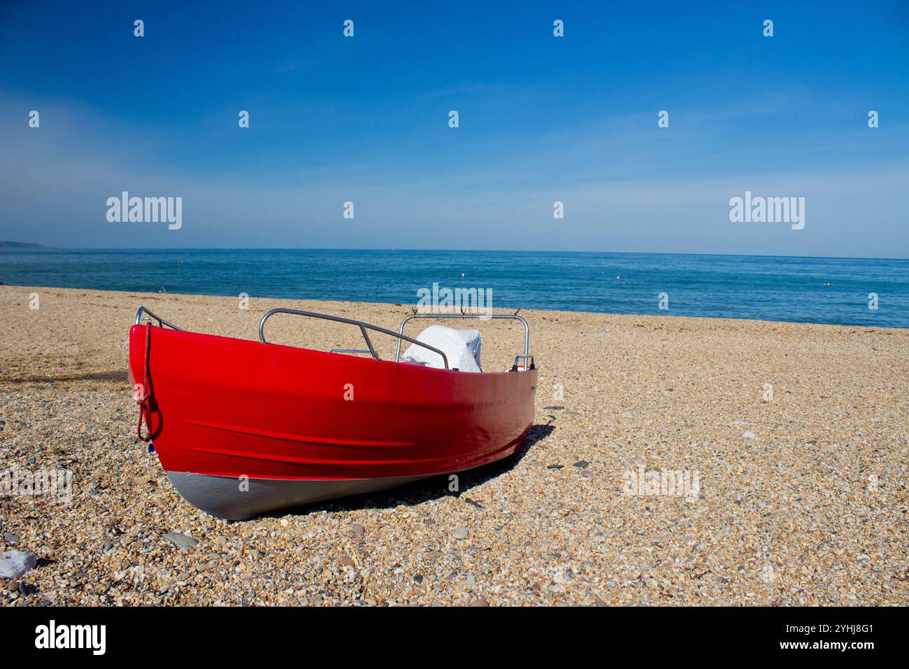 Red Boat on Beach Stock Photo - Alamy