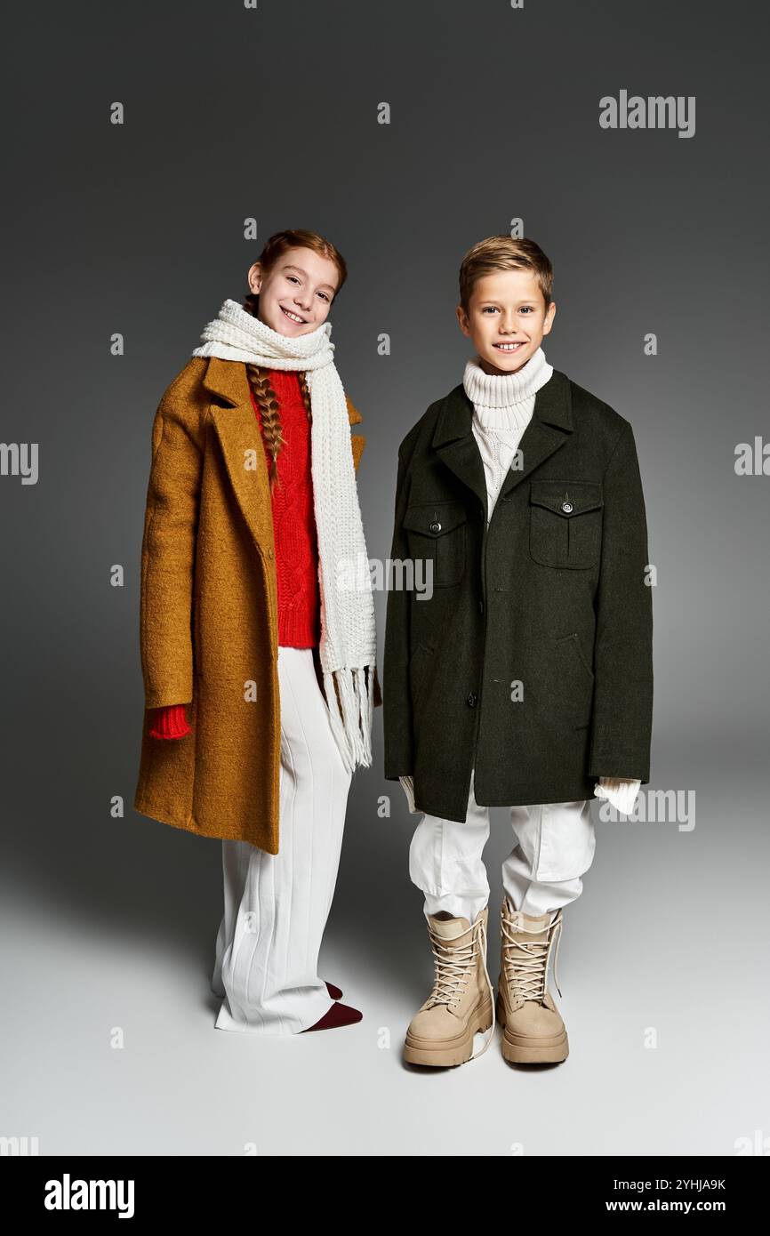Two children showcase cheerful winter fashion in cozy outfits and ...
