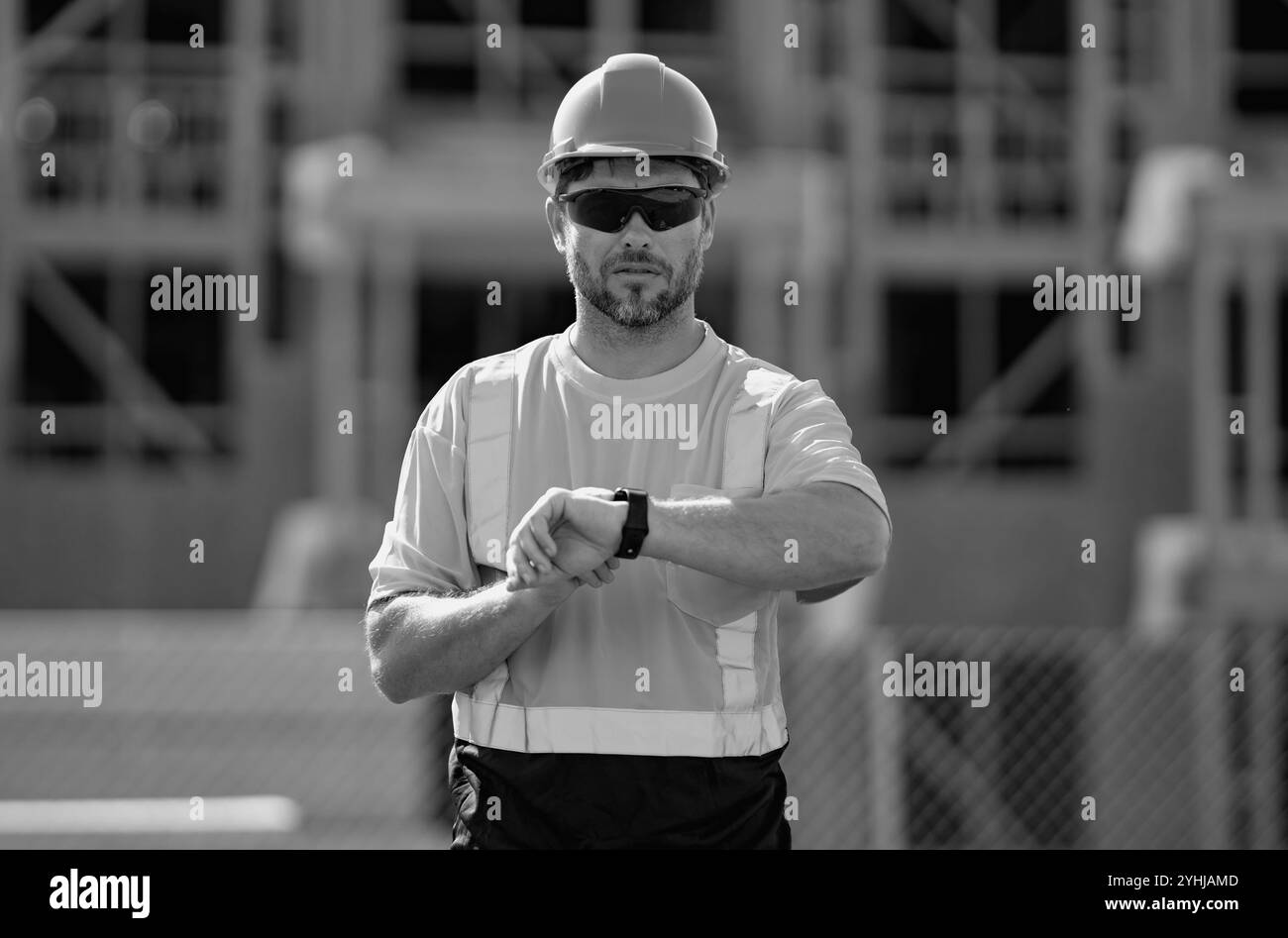 Construction man with helmet. Worker at construction new building ...
