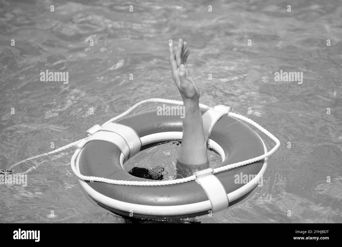Safety equipment. Life buoy or rescue buoy floating on water. Drowning ...