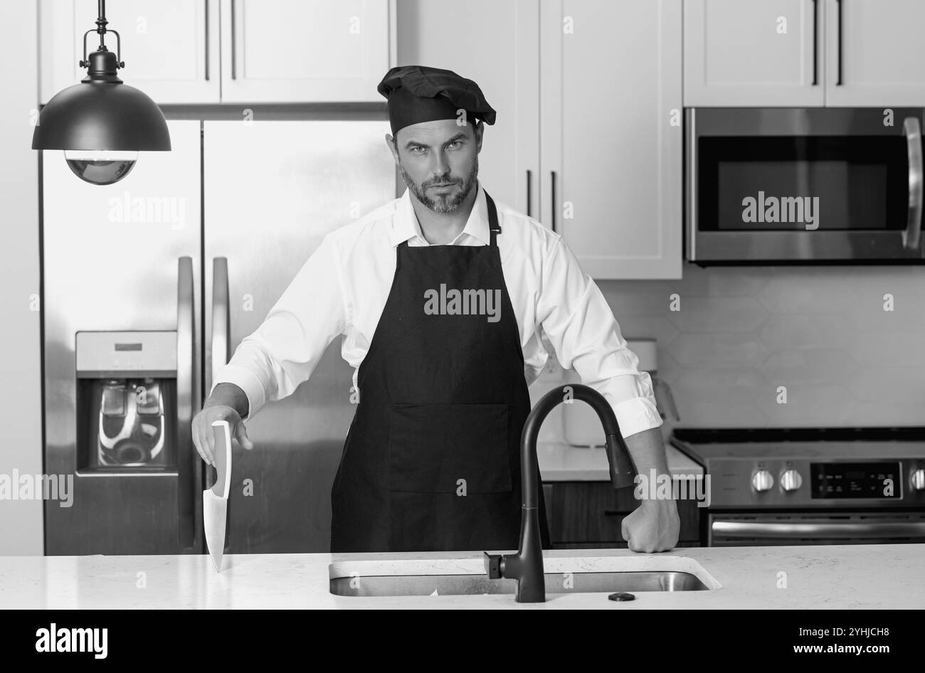 Man chef cooker baker. Millennial male chef in chefs uniform. Chef man ...