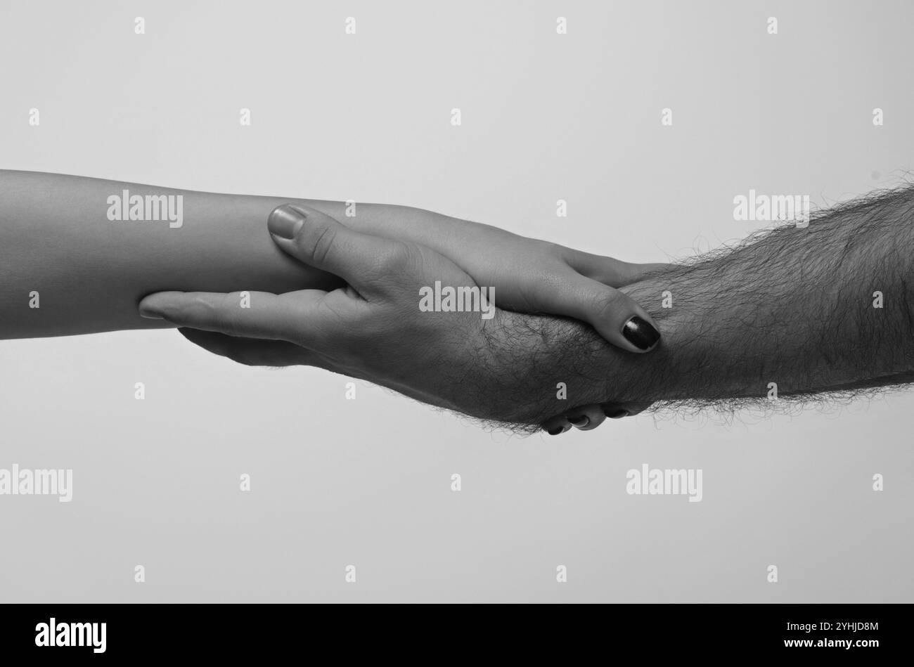 Hands reaching for each other Black and White Stock Photos & Images - Alamy