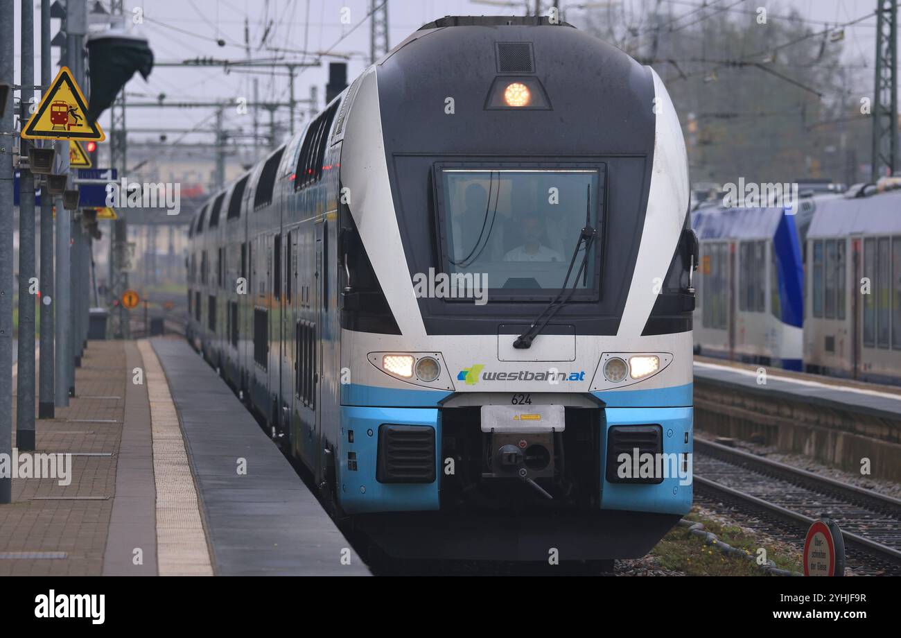 Augsburg, Germany. 12th Nov, 2024. A Westbahn train pulls into the main ...