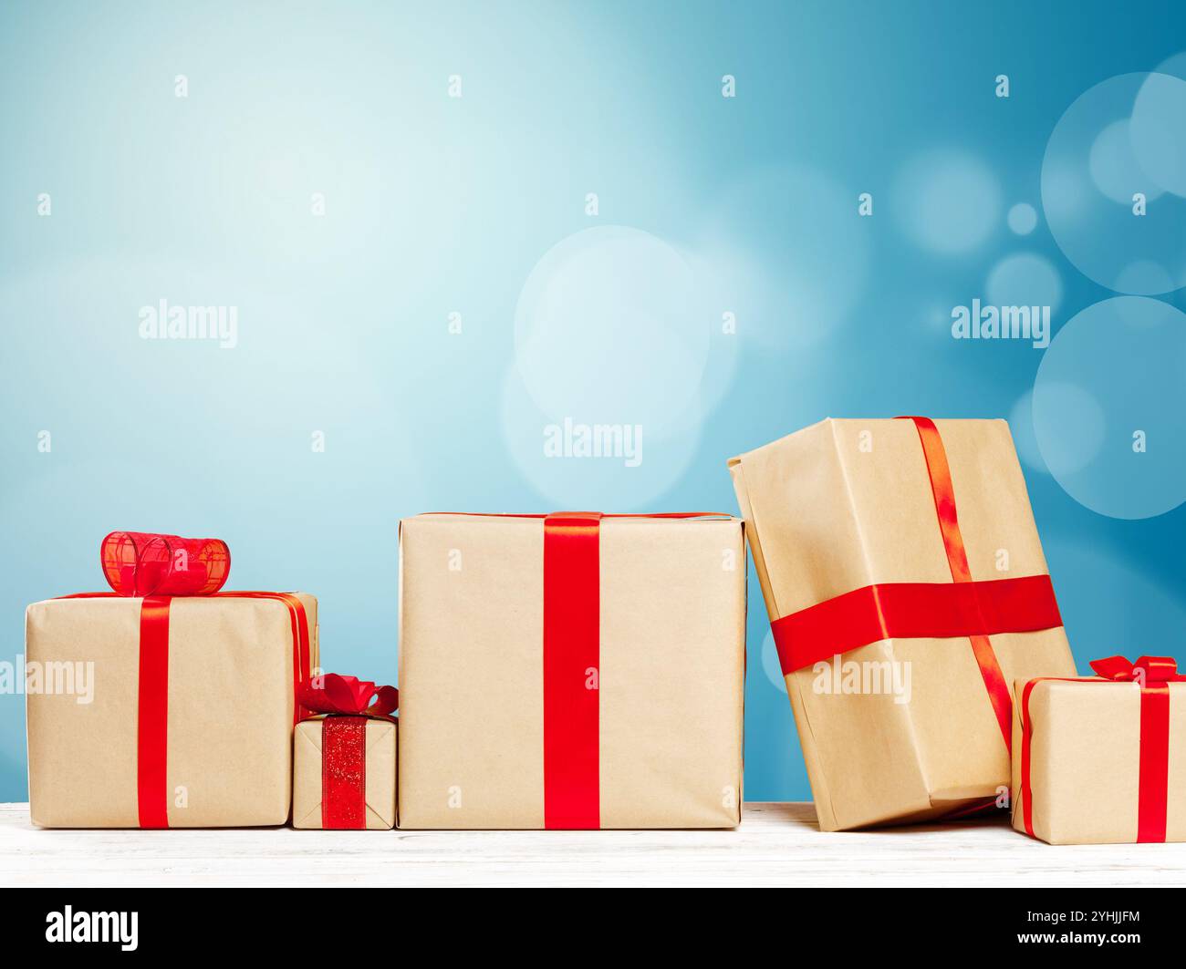 pile of gifts on the old table Stock Photo - Alamy