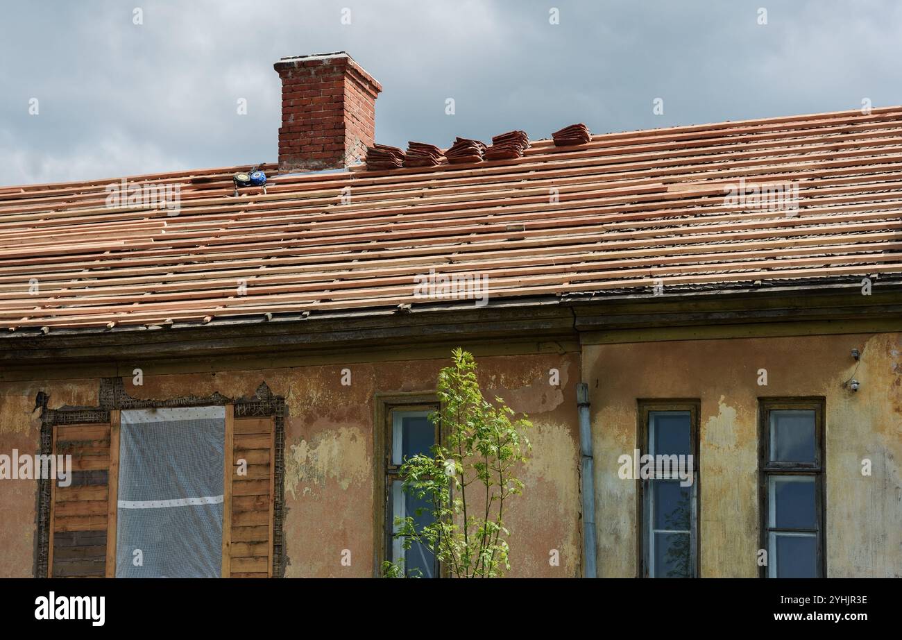 Repair of the roof of an old house Stock Photo - Alamy