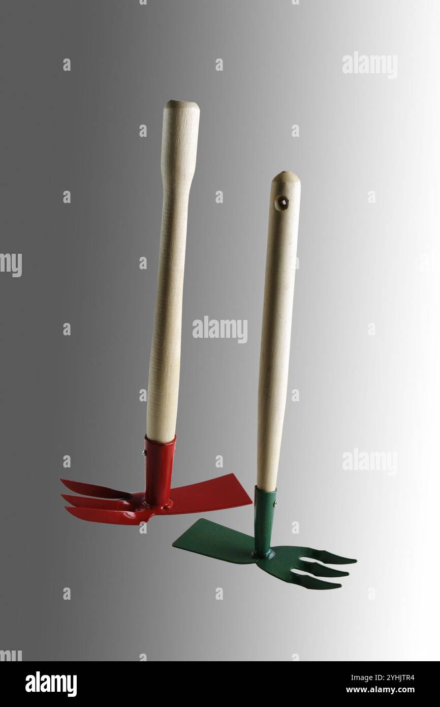 Tool for tillage. Red garden ripper. Close-up on white background Stock ...