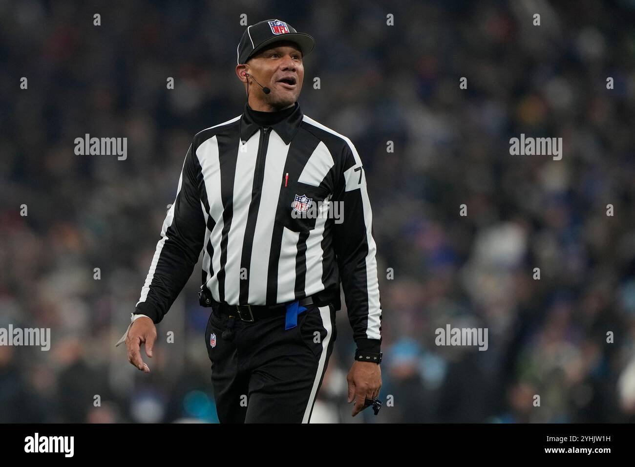 Umpire Terry Killens looks on during an NFL football game between the ...