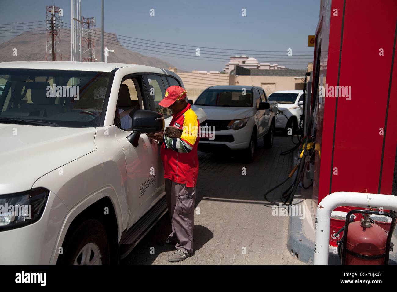 Petrol station attendent hi-res stock photography and images - Alamy
