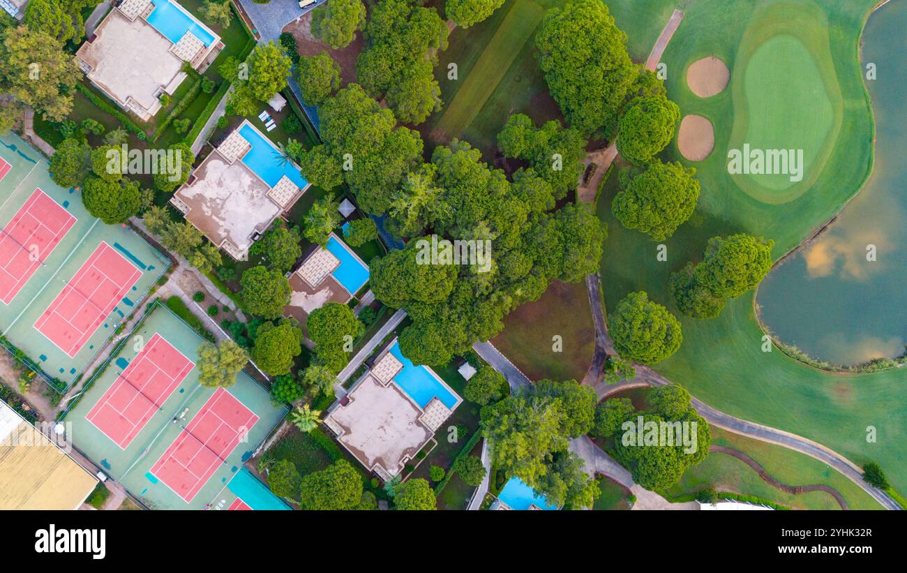Scenic top-down view of a resort complex featuring villas, swimming ...