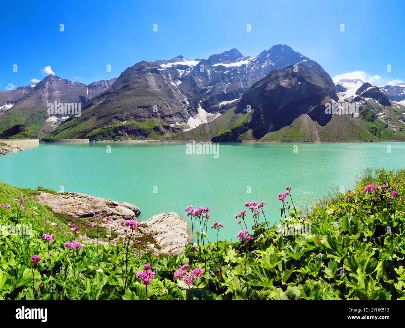 Turquoise alpine lake surrounded snow hi-res stock photography and ...