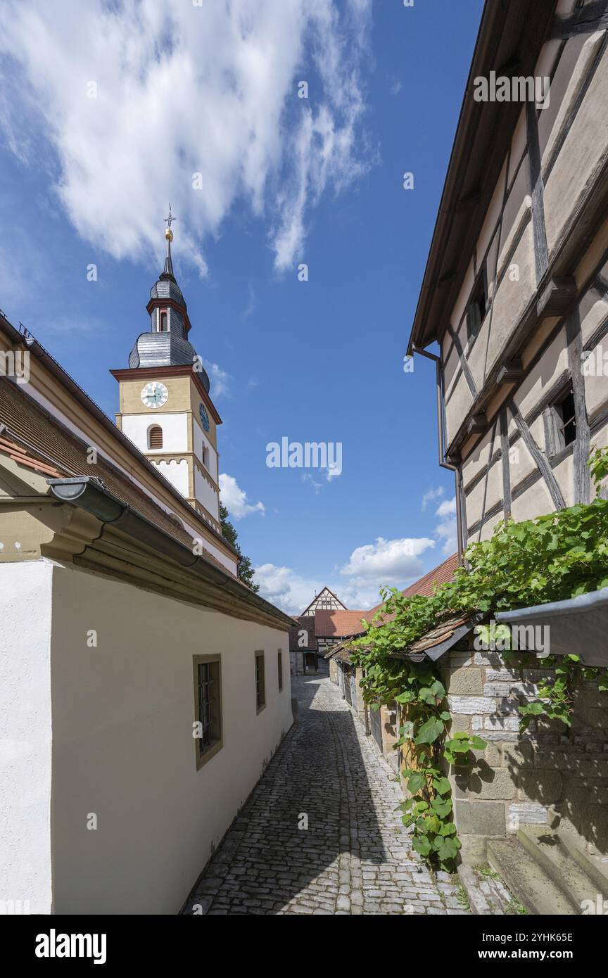 Inner courtyard with wine cellars and St John's Church in the historic ...