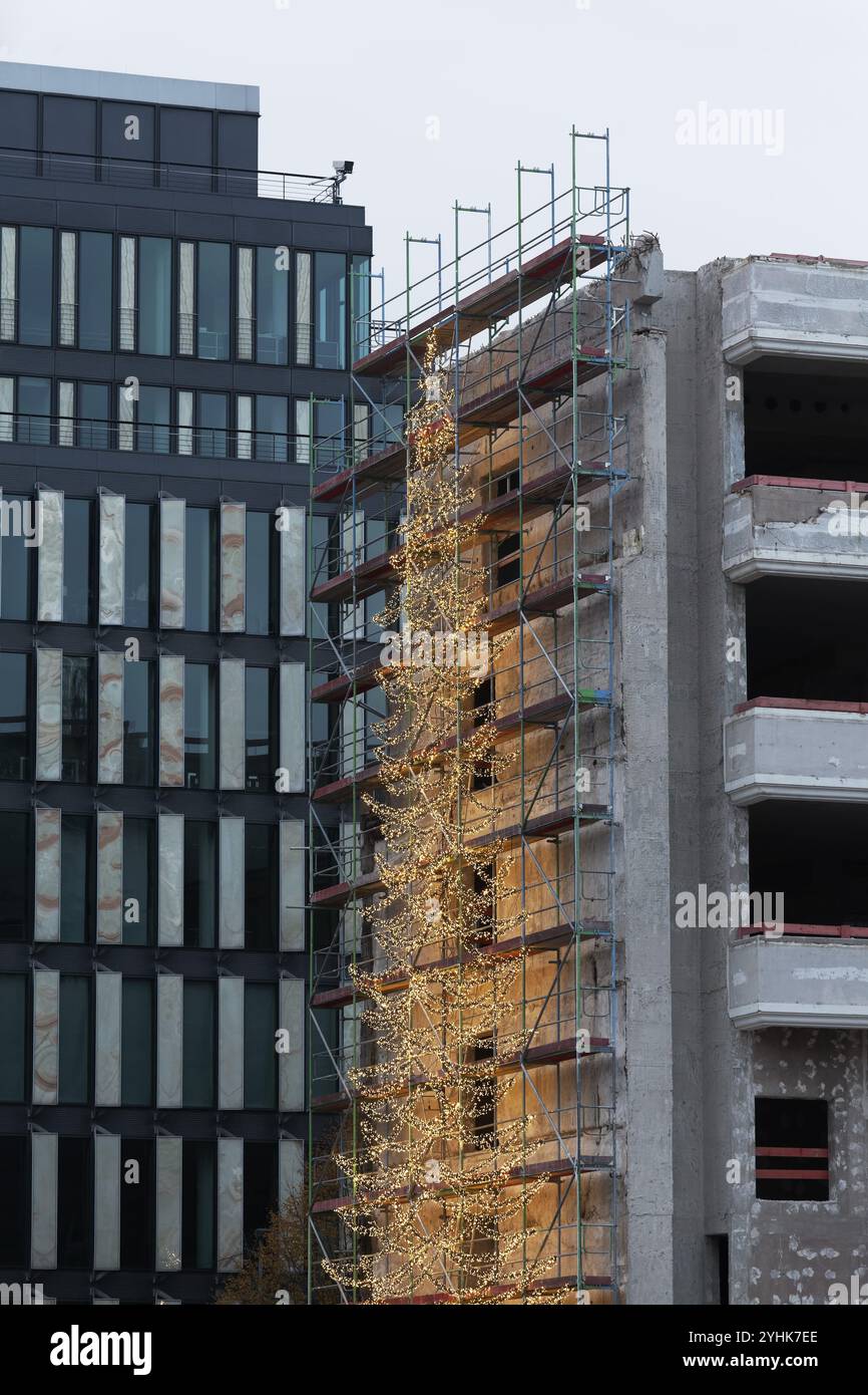Christmas tree made of fairy lights on scaffolding, office building ...