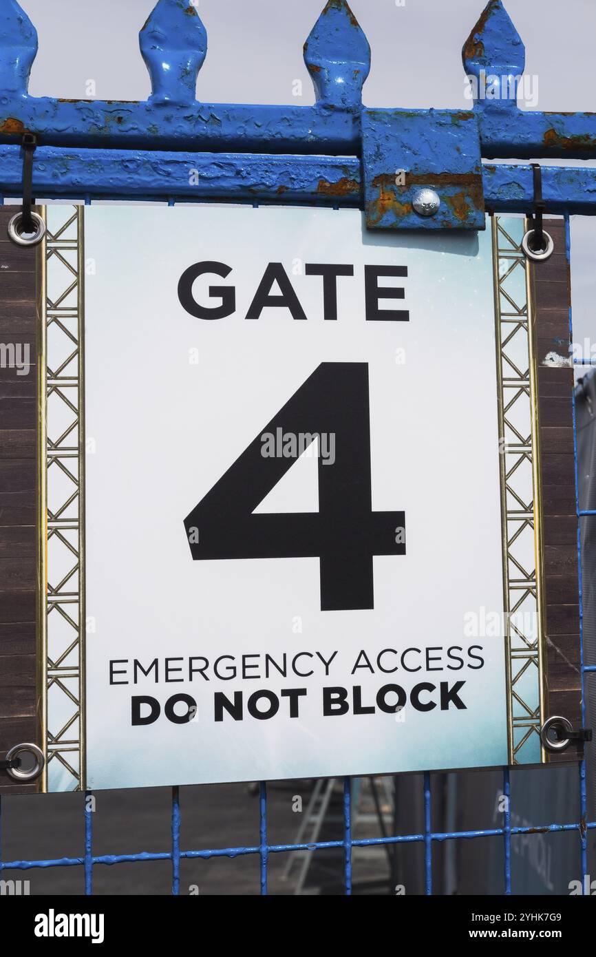 Close-up of posted emergency access gate 4 Do Not Block notice sign on ...