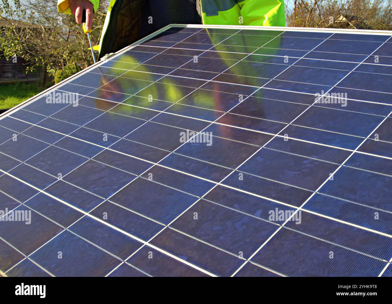 Installing solar panel Stock Photo - Alamy
