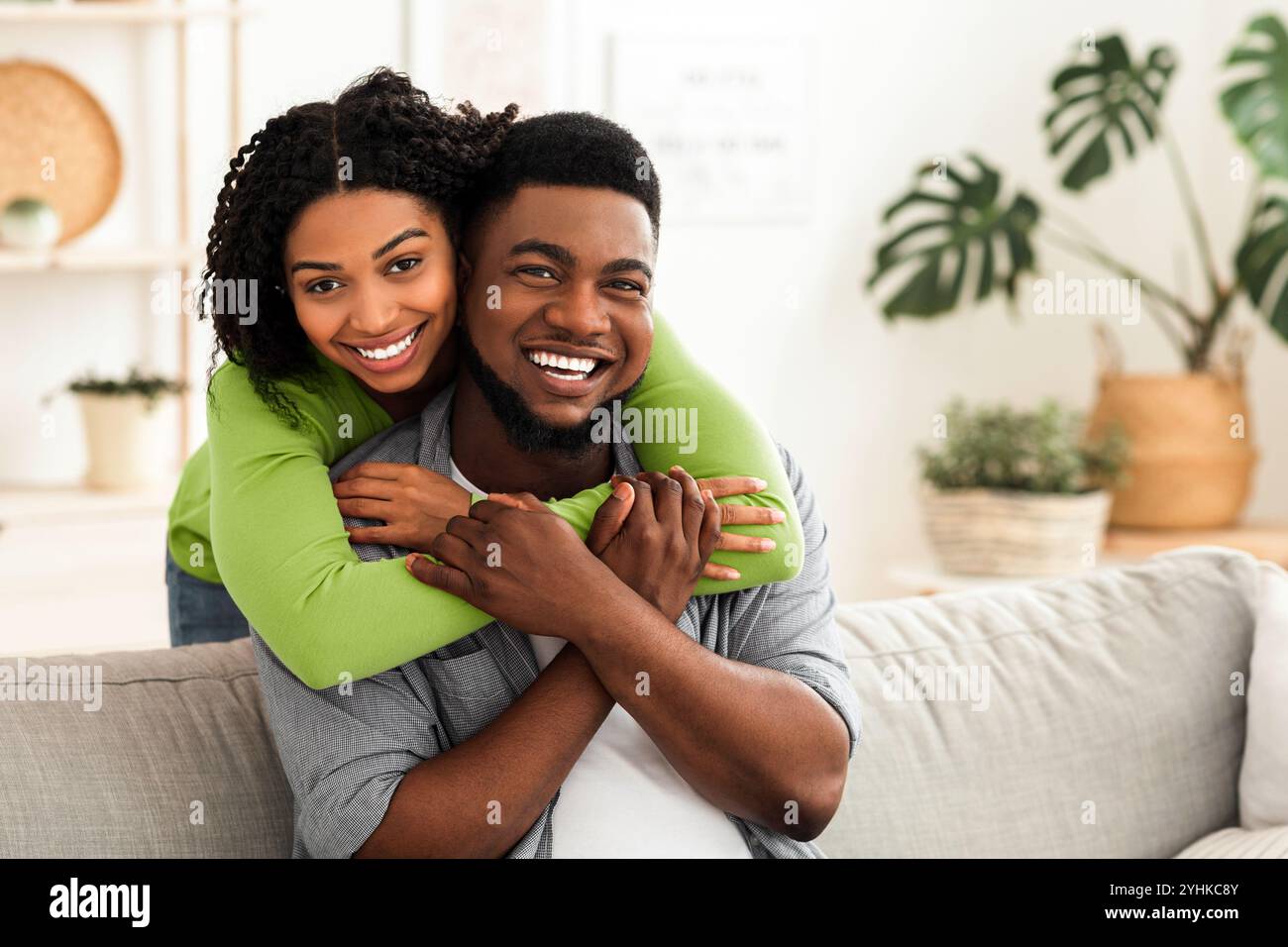 Happy Married Black Couple Cuddling At Home And Posing To Camera Stock ...