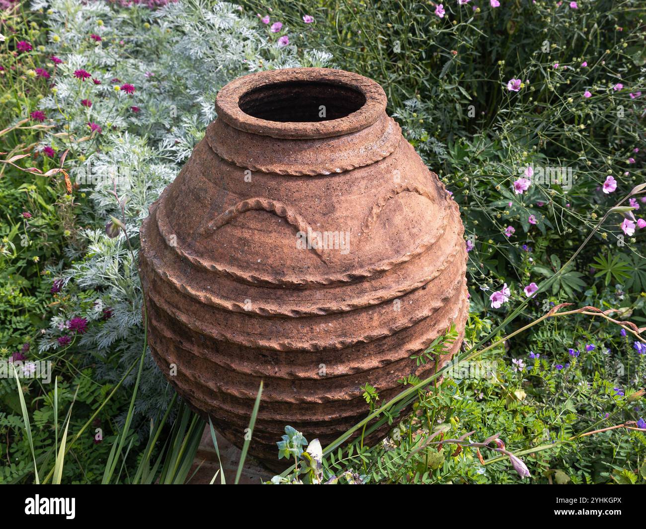 Terracotta urn at Burrow Farm Gardens Stock Photo - Alamy