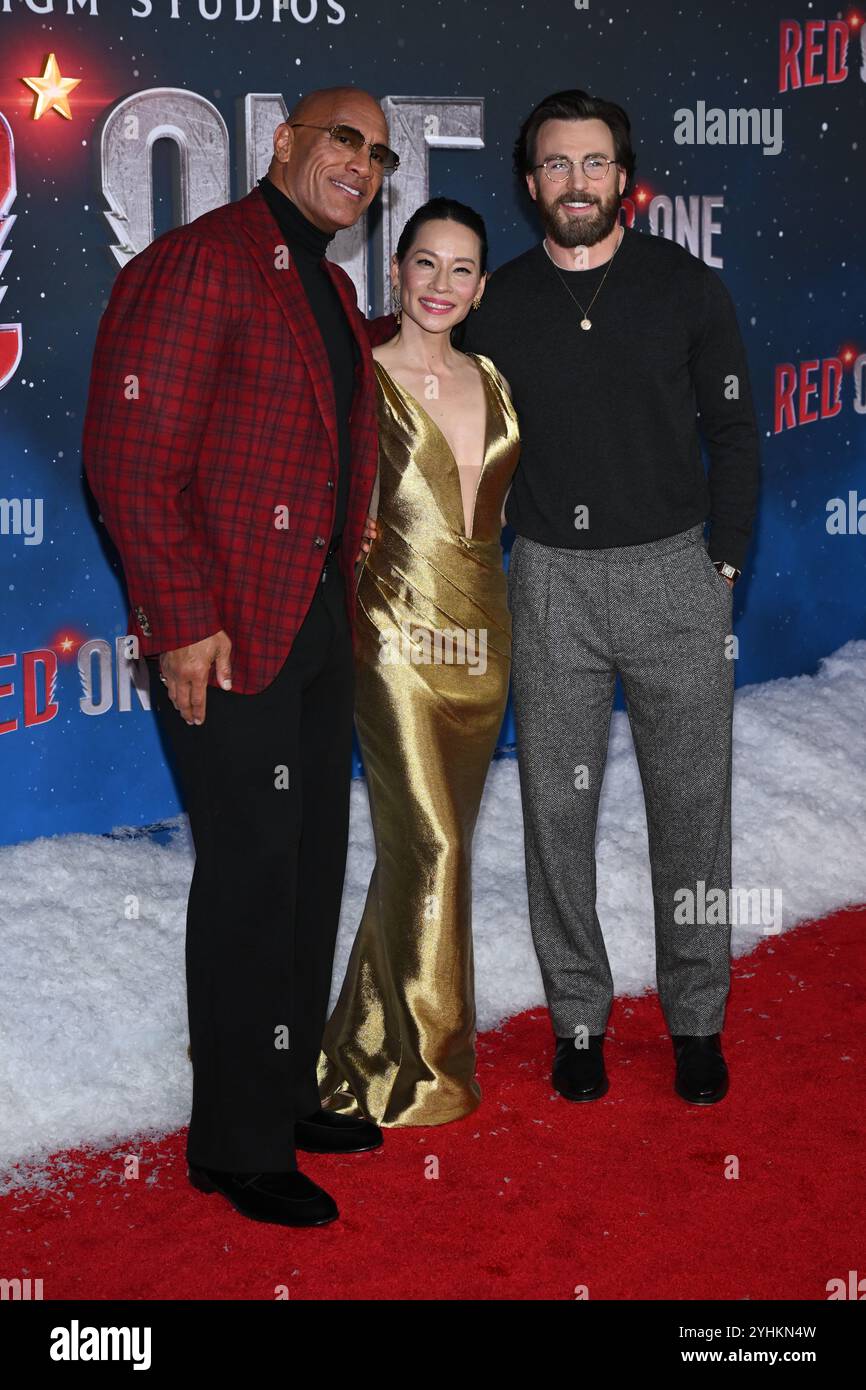 Dwayne Johnson, Lucy Liu and Chris Evans Stock Photo - Alamy