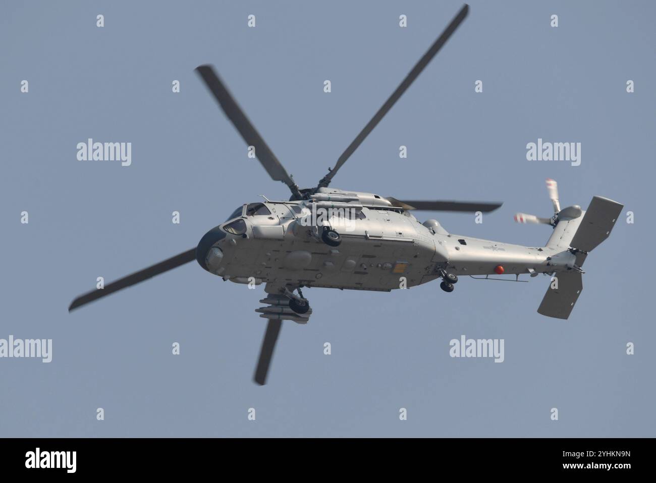 A Chinese Navy ship-borne helicopter Z-20 performs a flight ...