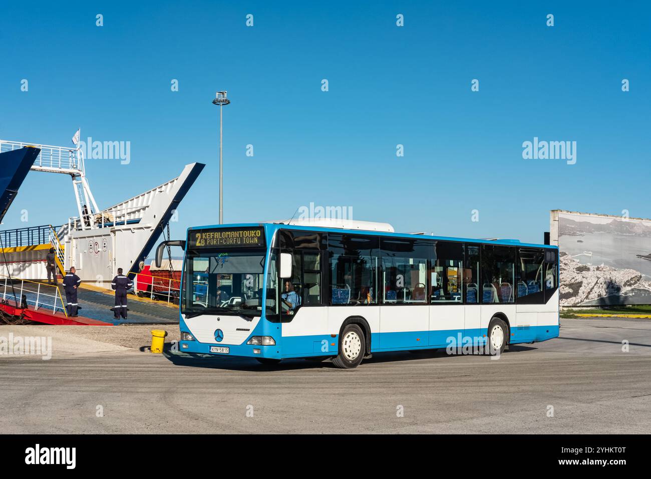 Coach bus. Blue public bus awaiting for passengers at the port in Corfu ...