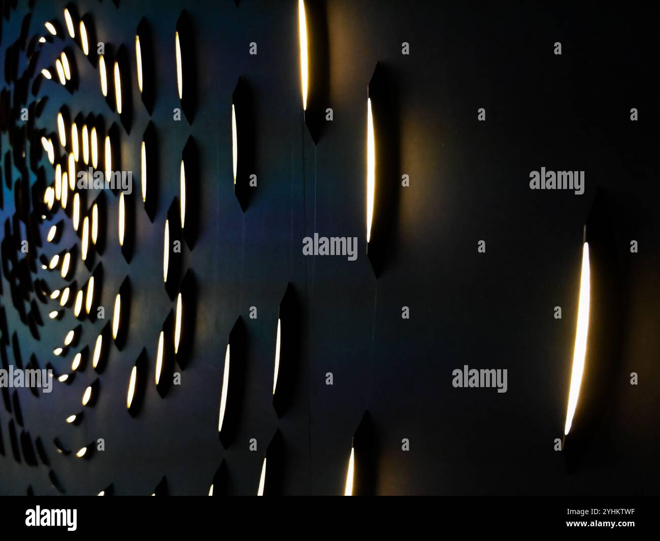 Abstract Light Installation with Geometric Pattern on Dark Surface ...