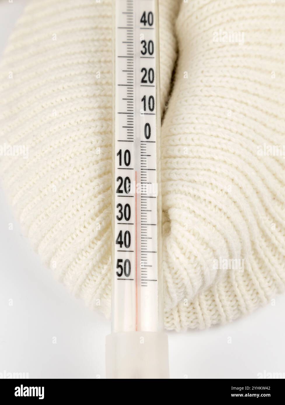 The thermometer on the winter hat shows a low temperature of 11 degrees ...