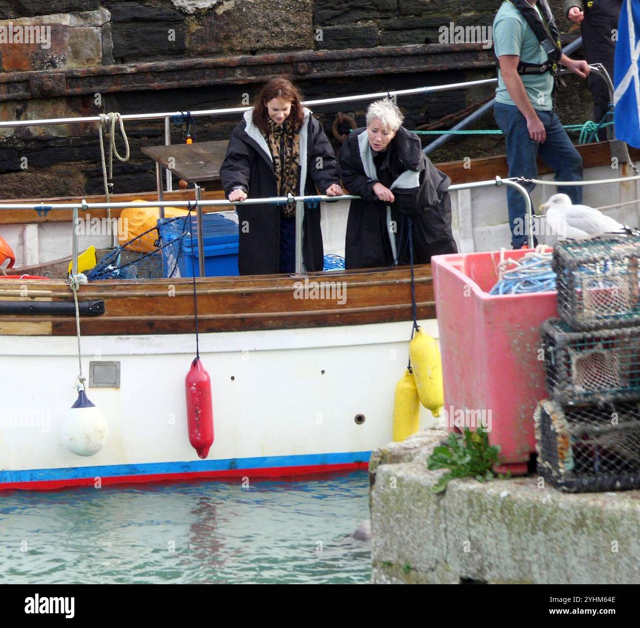 Emma Thompson and Ruth Watson are entertained by a wild seal whilst ...