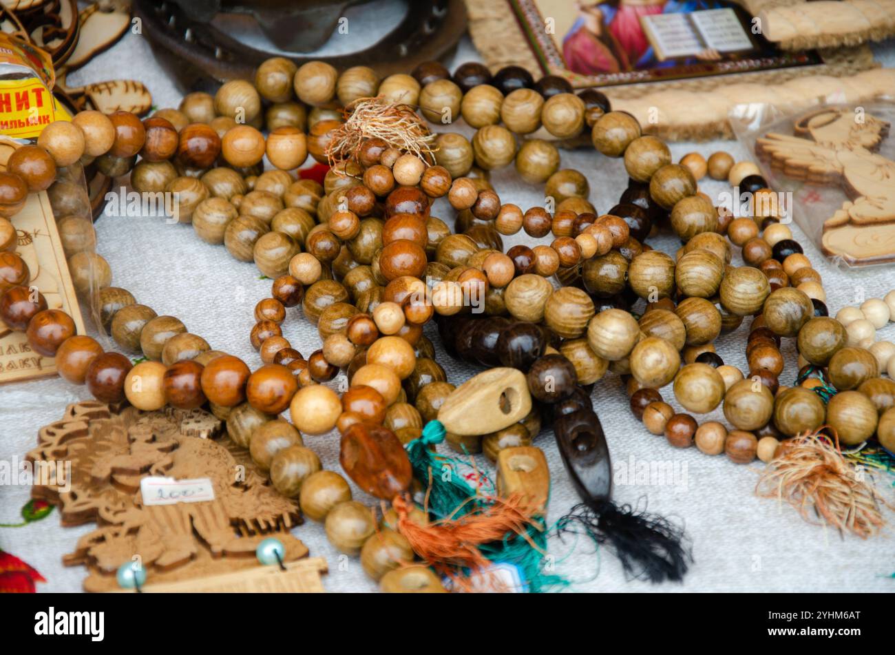 Decorative items made from beads and wood seeds Stock Photo - Alamy
