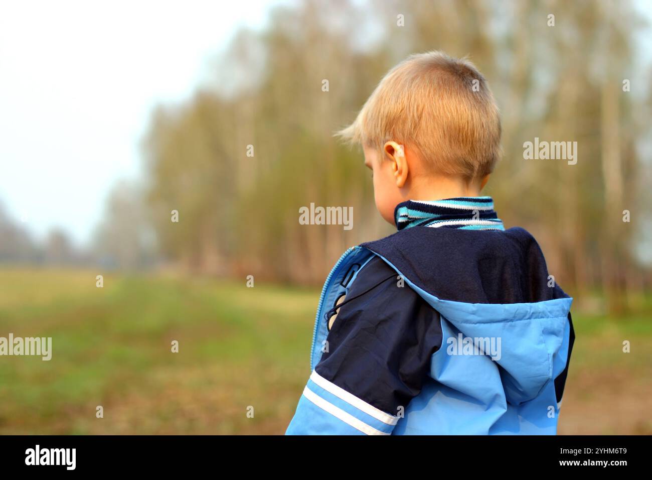 lost and sad boy stand outdoor Stock Photo - Alamy