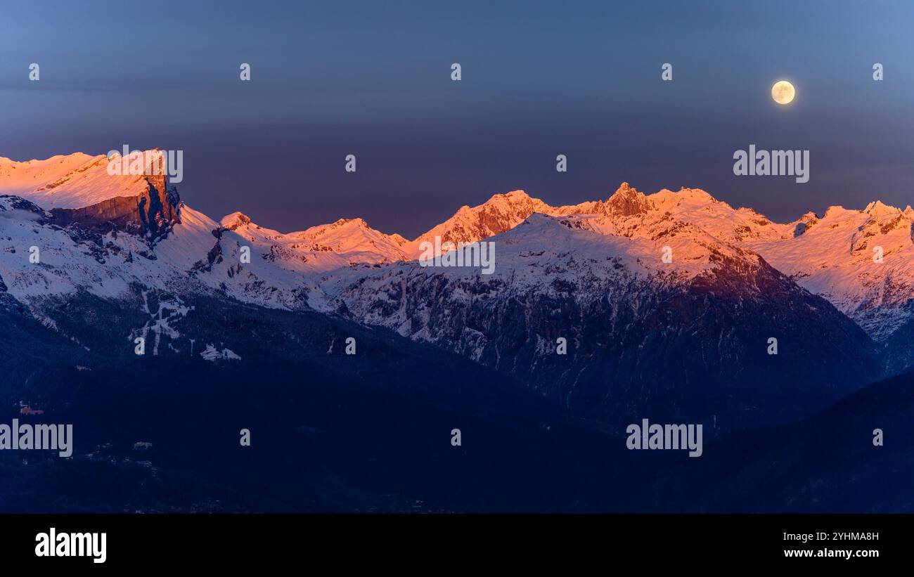 Sunset and full moon over the Alps, Haute-Savoie, France Stock Photo ...