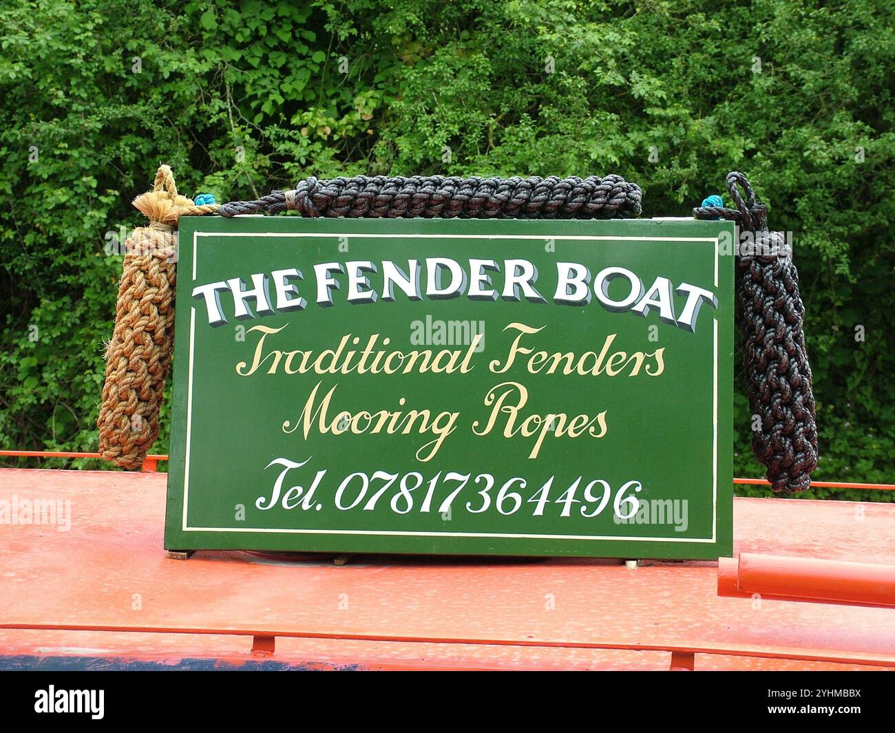 The Fender makers sign on a barge moored in the Kennet and Avon Canal ...