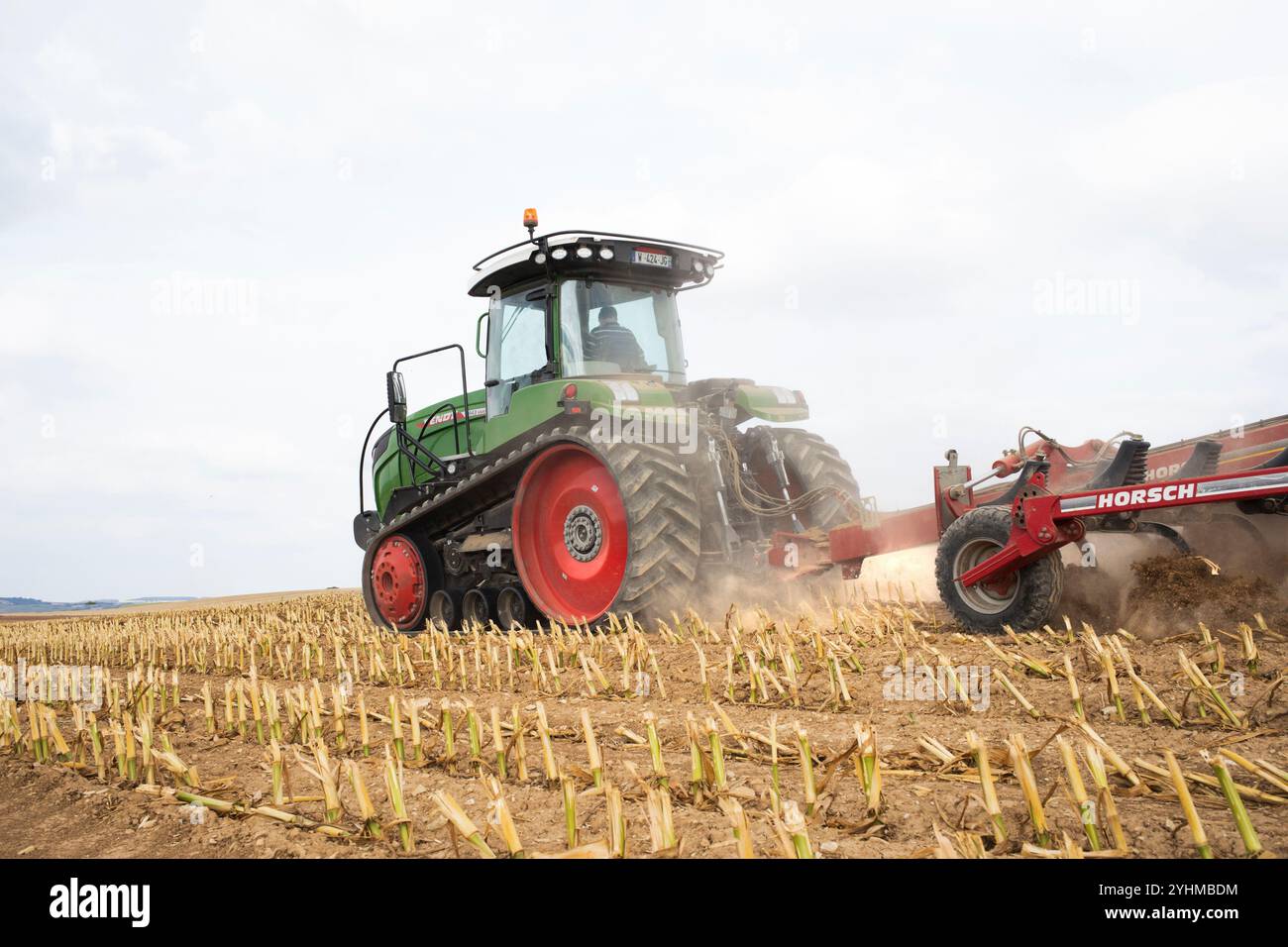 5oo hp Fendt tractor with tracks, pulling a 6 m tine implement over ...