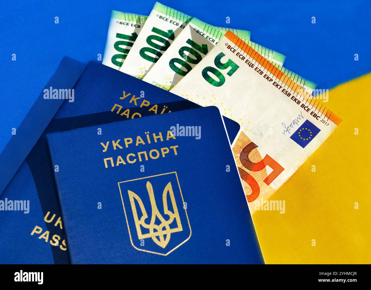 Passports of Ukraine and euro currency on the background of the ...