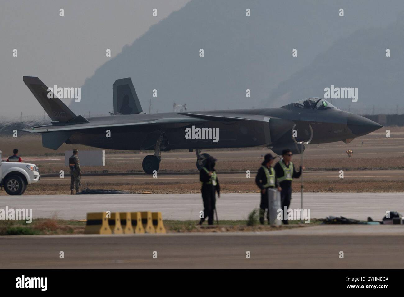 A Chinese J-20 stealth fighter jet lands after performing at the 15th ...