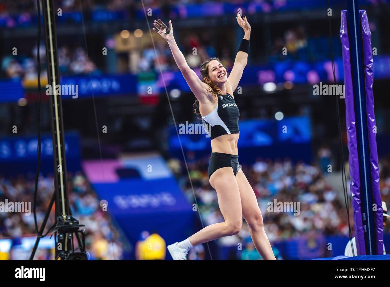 Eliza McCartney participating in the pole vault at the Paris 2024 ...