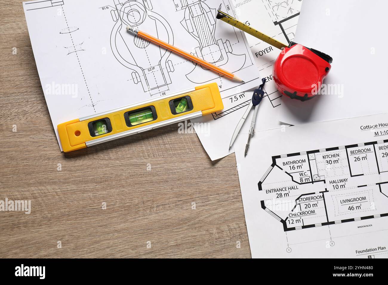 Different engineering drawings, building level, measuring tape, pencil ...