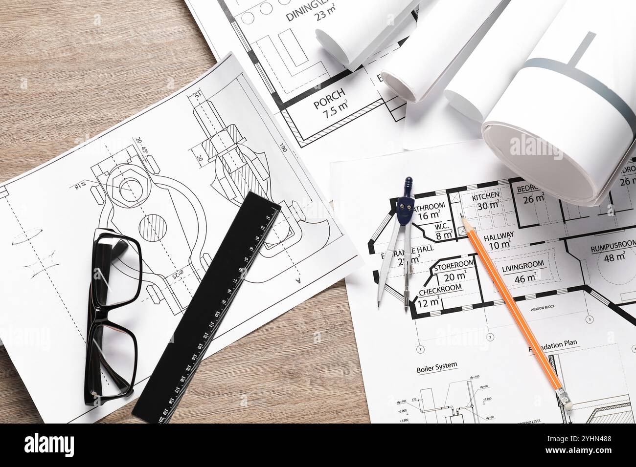 Different engineering drawings, glasses, ruler, pencil and dividers on ...