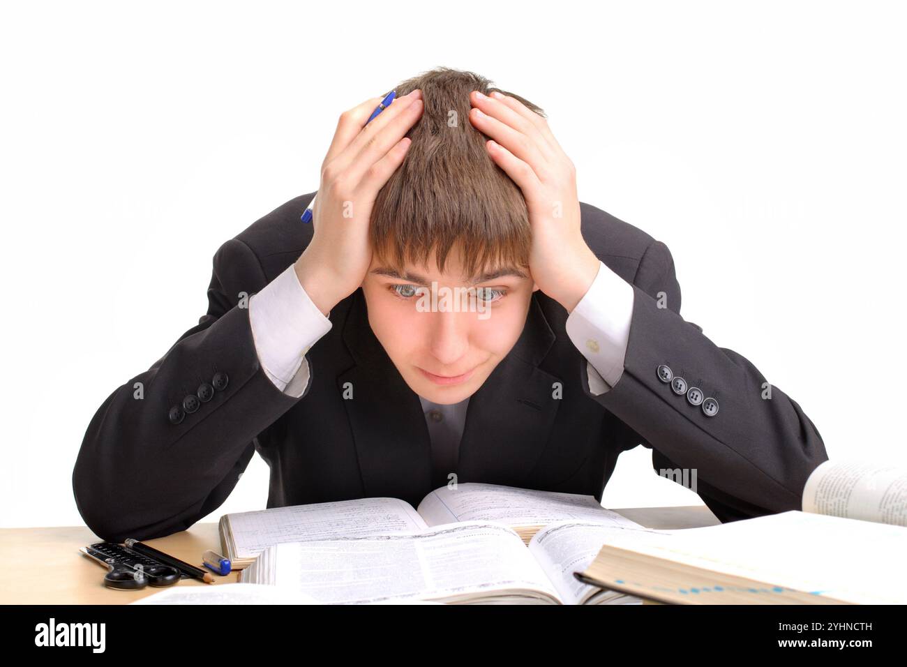 shocked teenager studying hard for the exam Stock Photo - Alamy