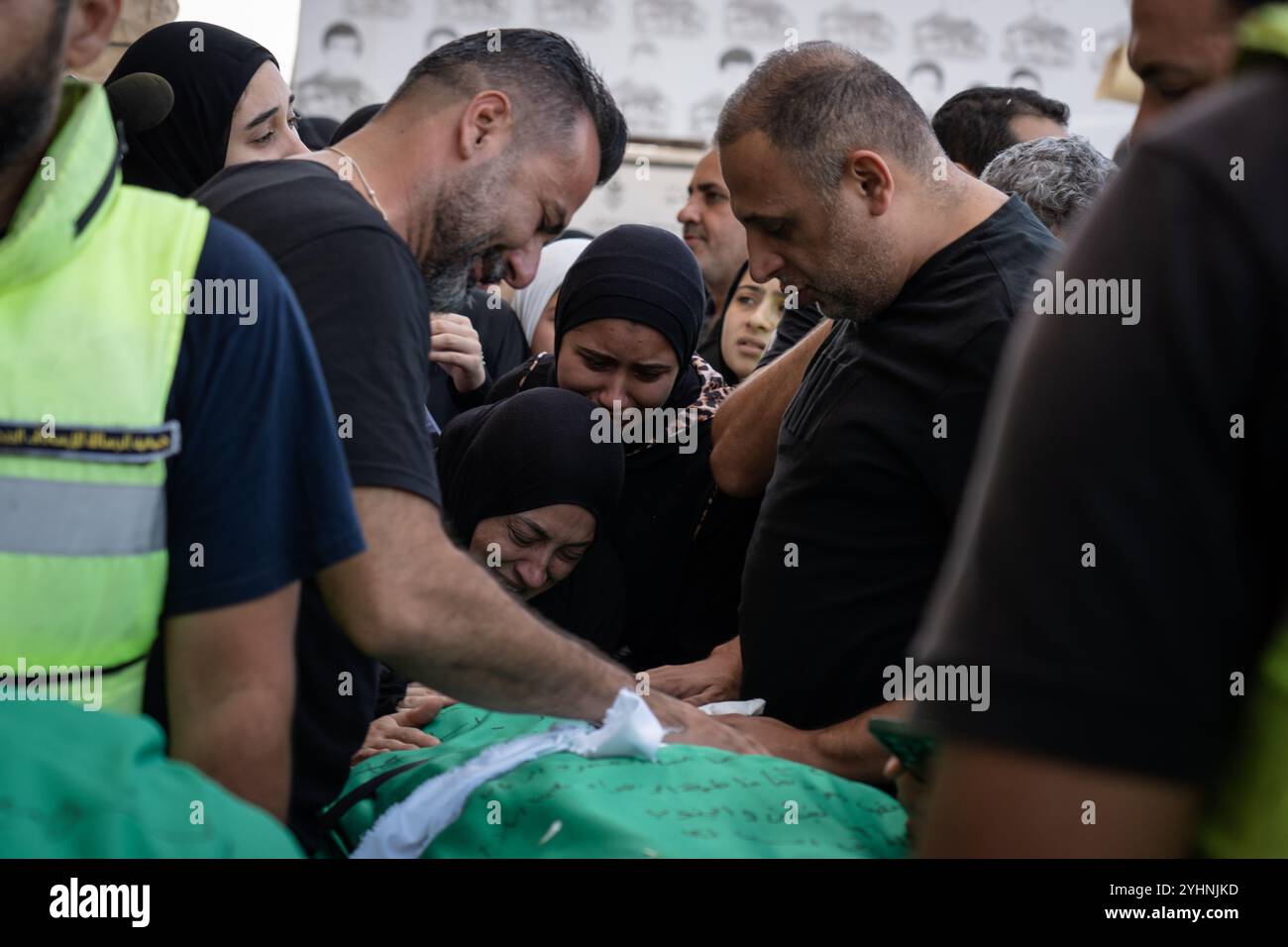 (EDITORS NOTE: Image depicts death)Family members seen mourning during ...
