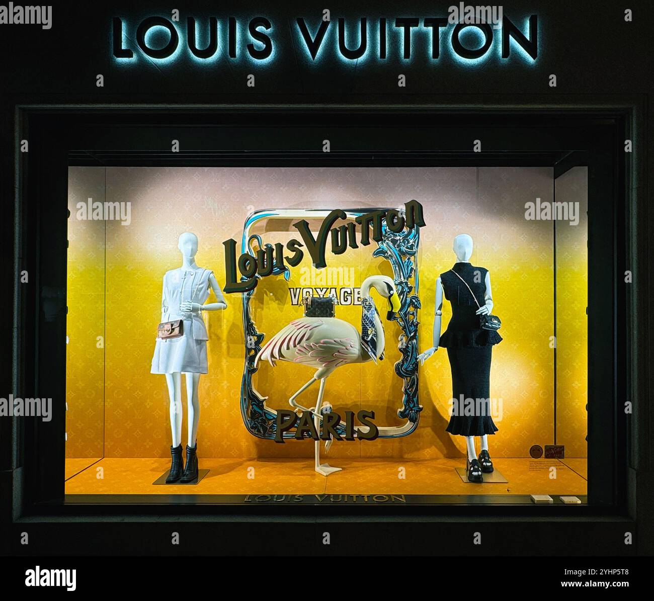 Louis Vuitton store window display in Madrid, Spain, 2024, night Stock ...