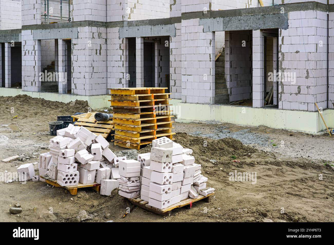 Construction site view of a new residential terraced house from ...