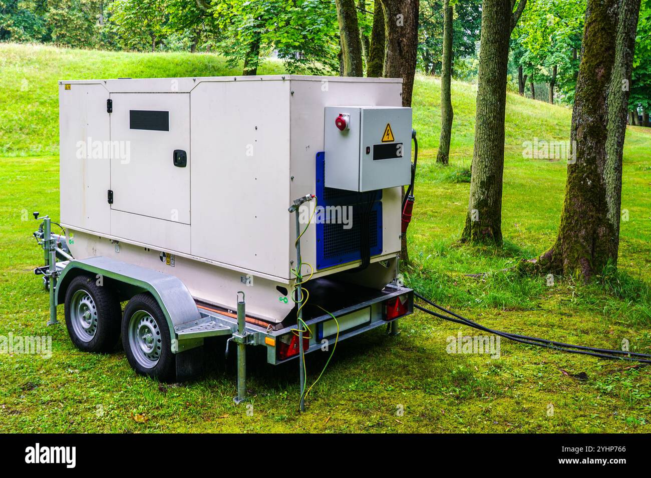 Connected large rental diesel generator on a mobile trailer for outdoor ...