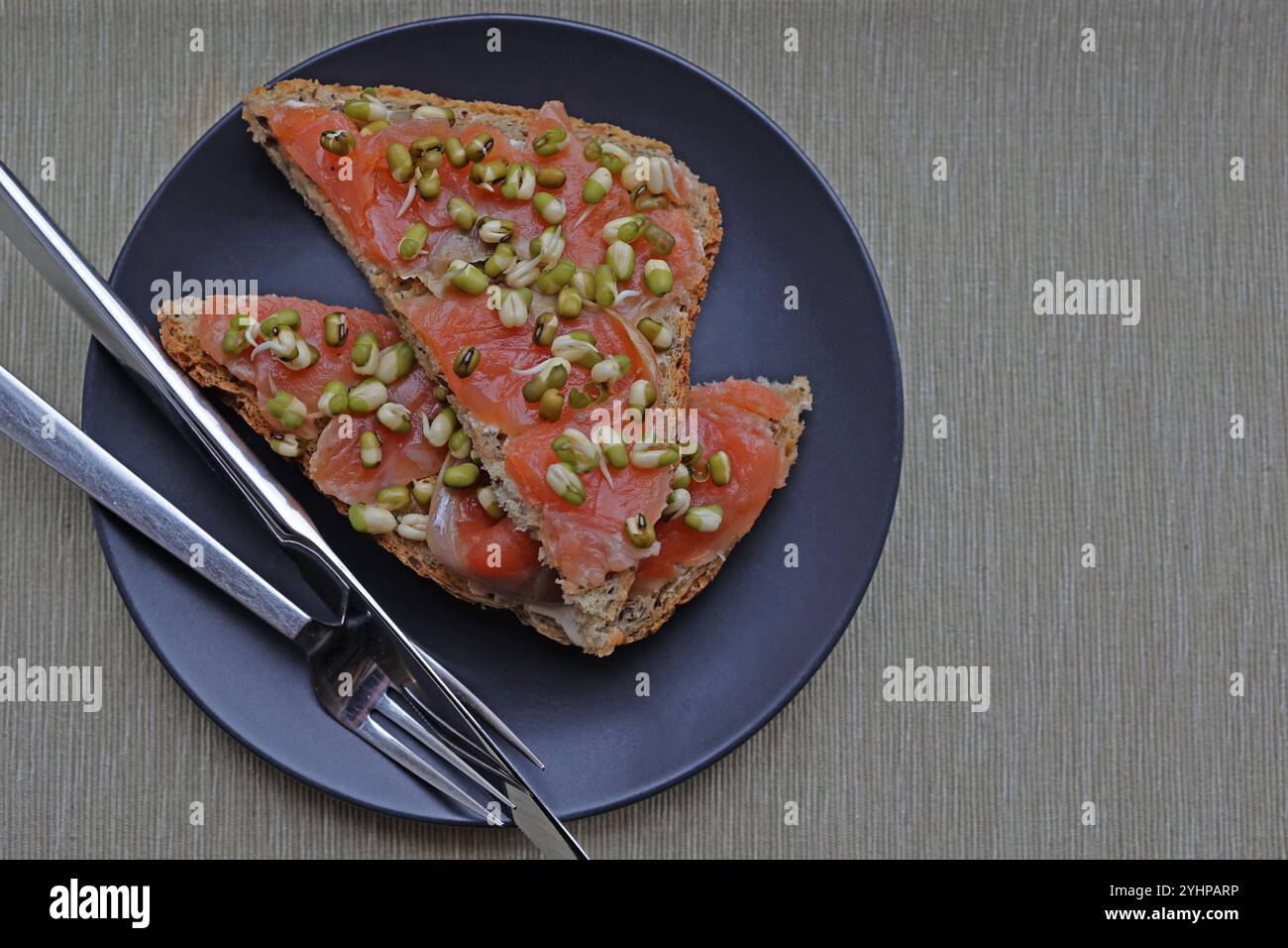 Whole-grain toast with lightly salted salmon and mung bean sprouts ...
