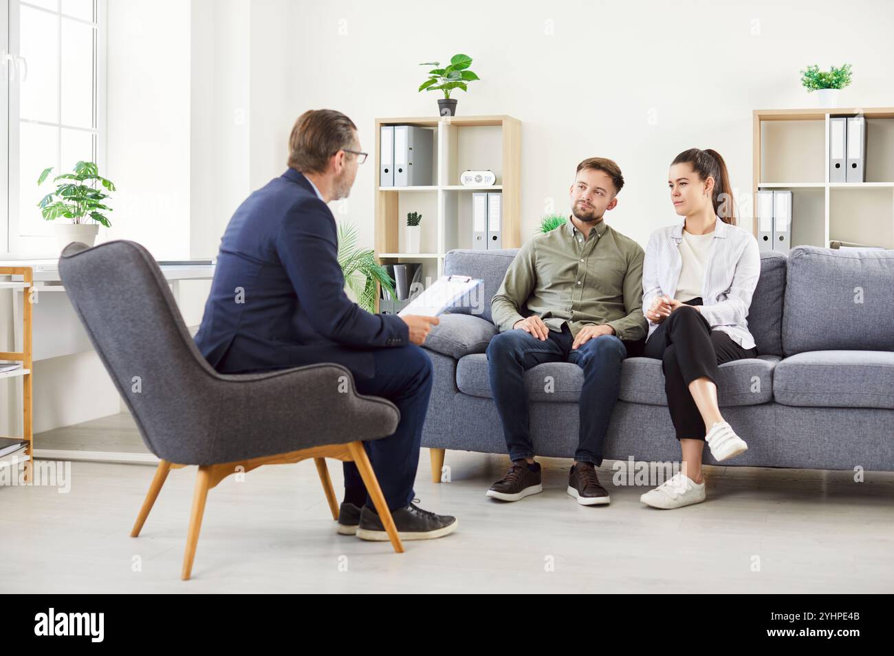 Psychologist conducting therapy session hi-res stock photography and ...