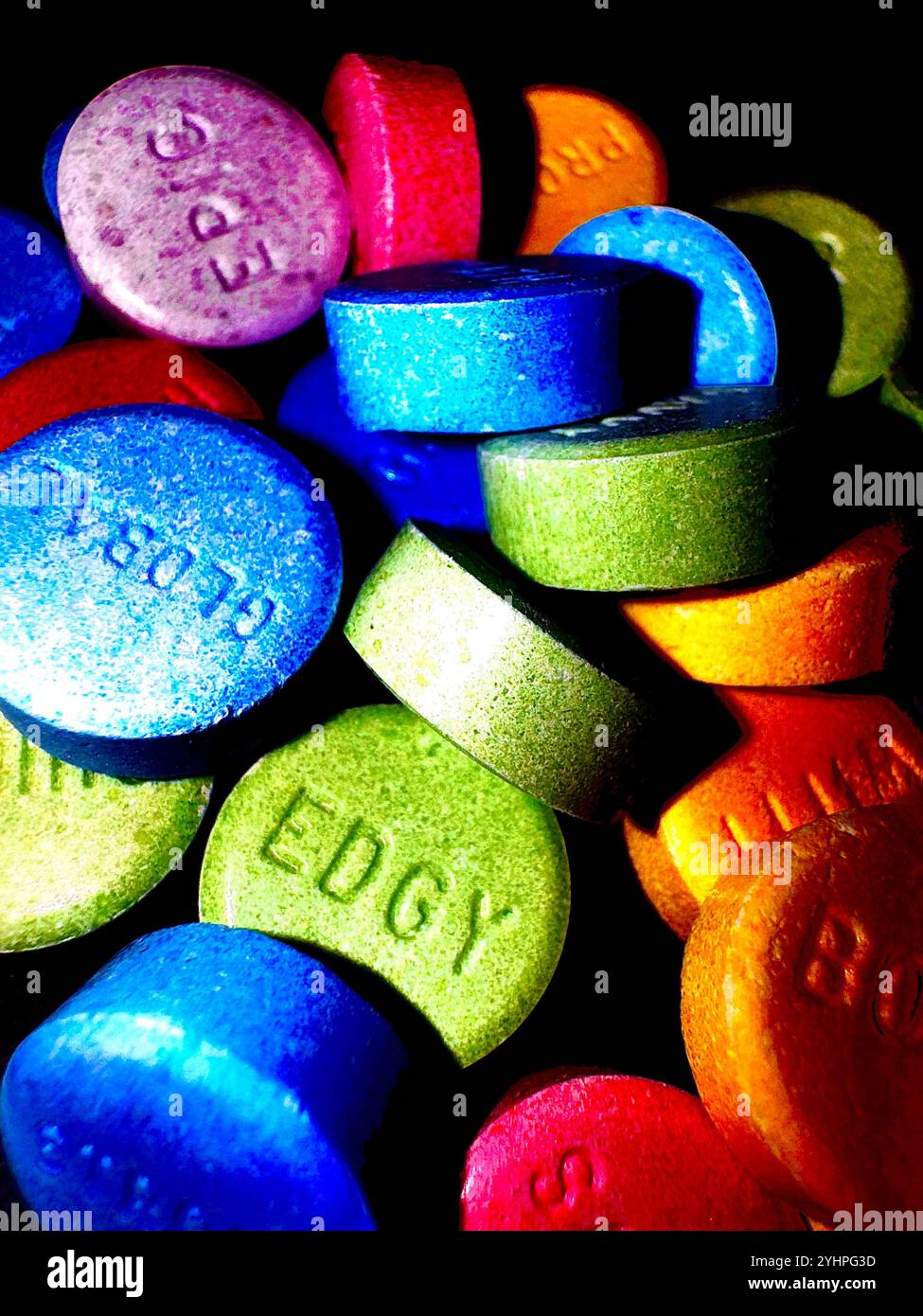 Colorful pile of different types of candies Stock Photo - Alamy