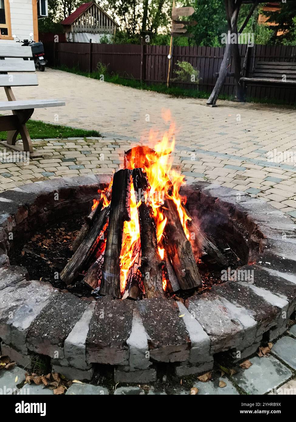 Fire burns in brick fireplace hi-res stock photography and images - Alamy
